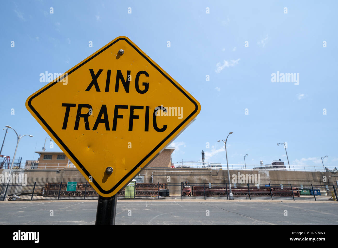 Sign for Crossing (XING) traffic, warning drivers Stock Photo - Alamy