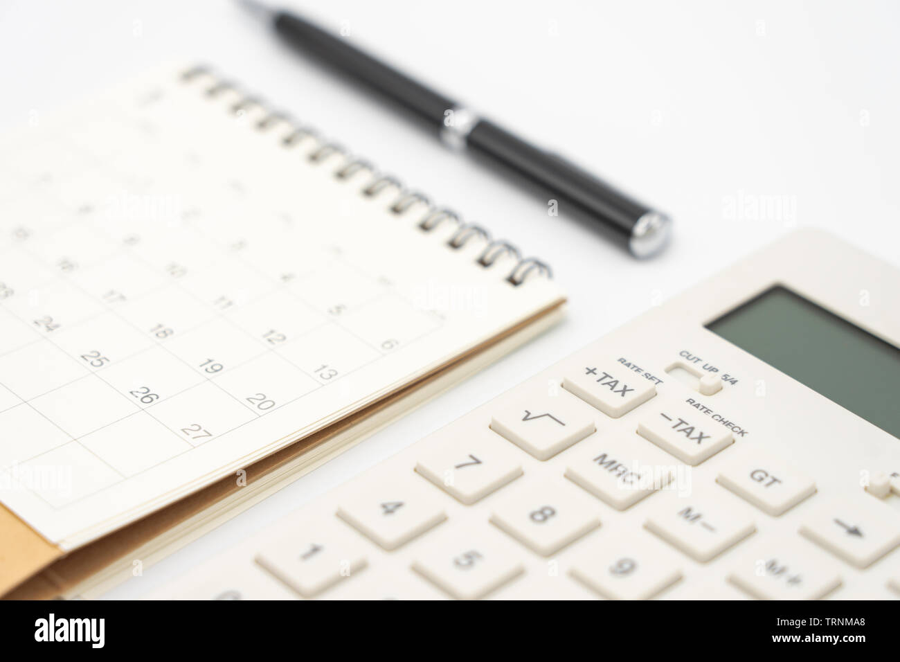 Flat lay of top view office table desk with Calendar, calculators pens ...