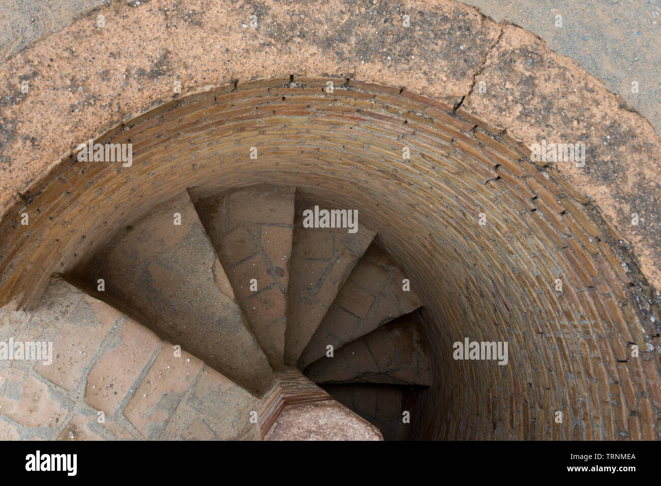 spiral staircase on excavation site in alhambra palace, granada, spain ...