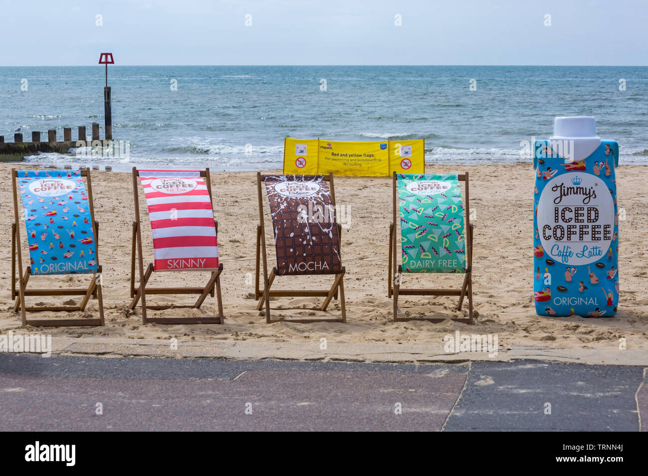 Jimmys Iced Coffee fabric deckchairs and carton at Bournemouth beach ...