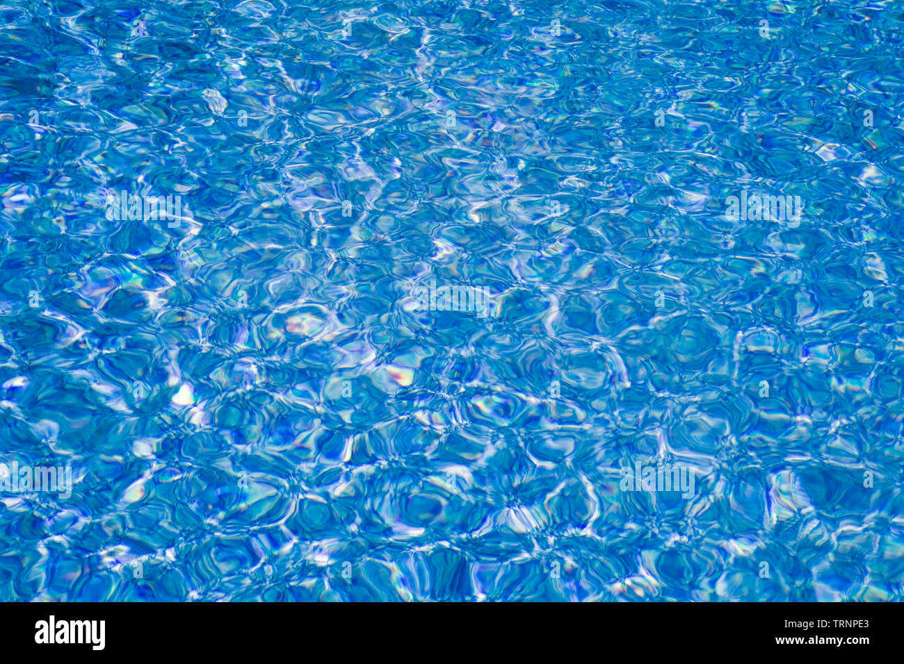 Swimming pool water surface background Stock Photo - Alamy