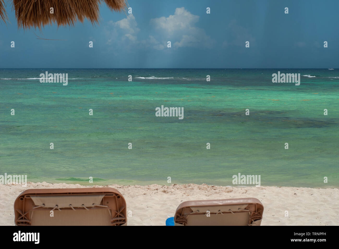 View of Tulum beach, with a summer storm coming, in the Mexican Yucatan ...
