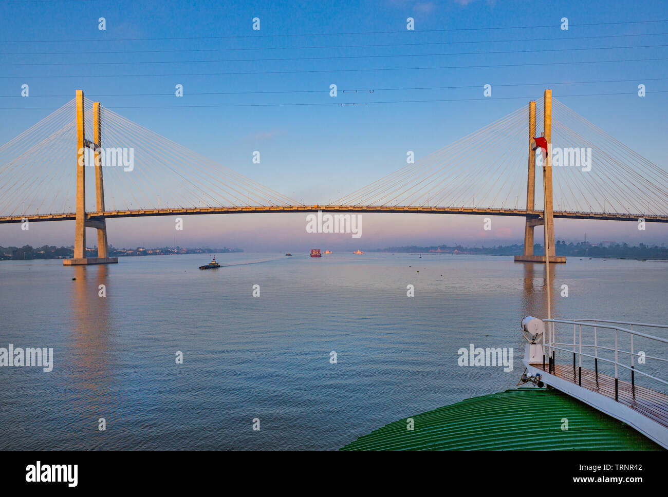 A suspension bridge over the Mekong River, Vietnam Stock Photo - Alamy
