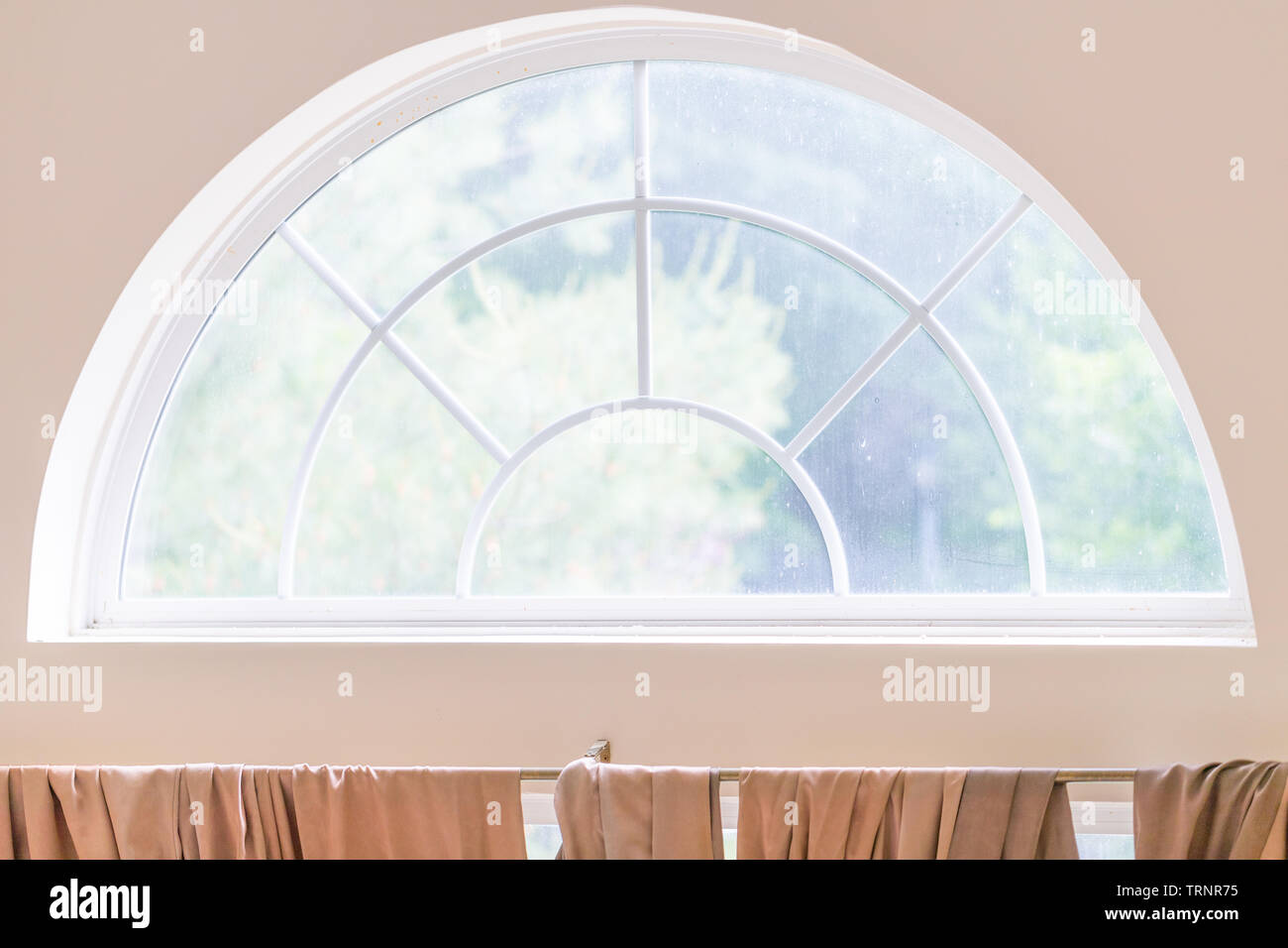 Half-round window in house - Image Stock Photo - Alamy