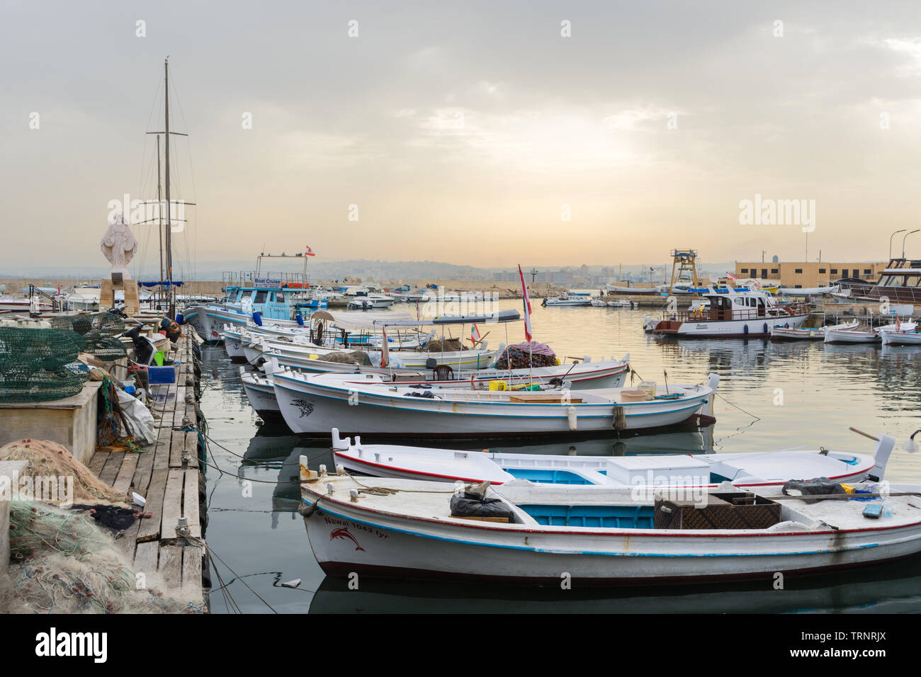 Boats in Tyre harbour in early morning, Tyre, Lebanon Stock Photo - Alamy