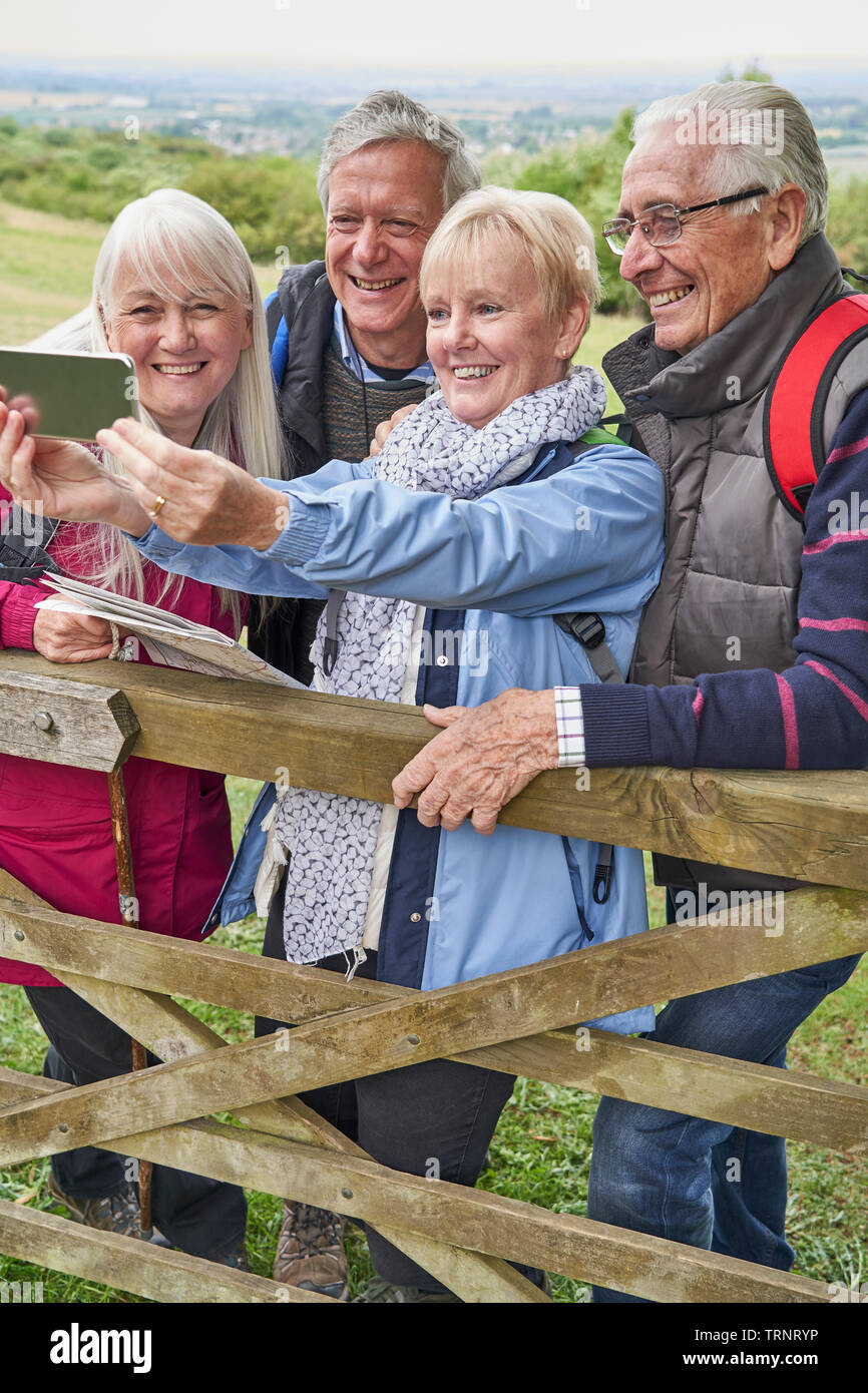 Group standing in countryside hi-res stock photography and images - Alamy