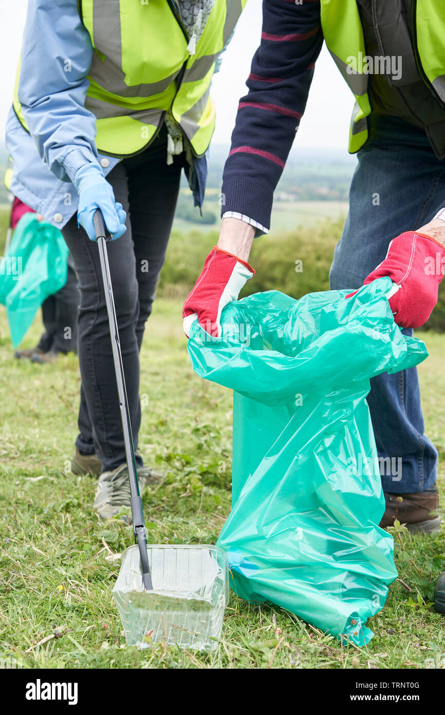 Collecting litter hi-res stock photography and images - Alamy