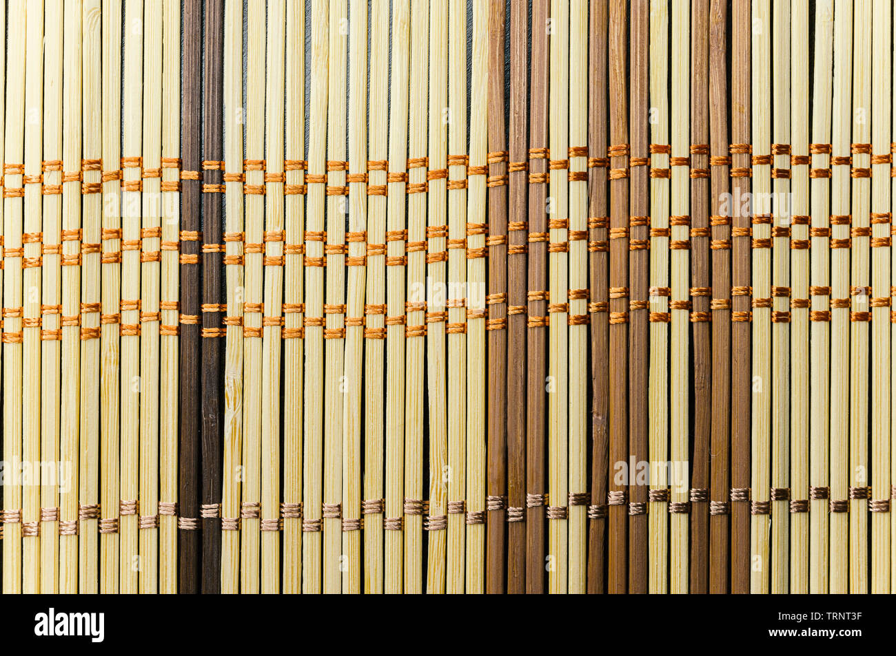 Sushi roll bamboo mat as background Stock Photo - Alamy