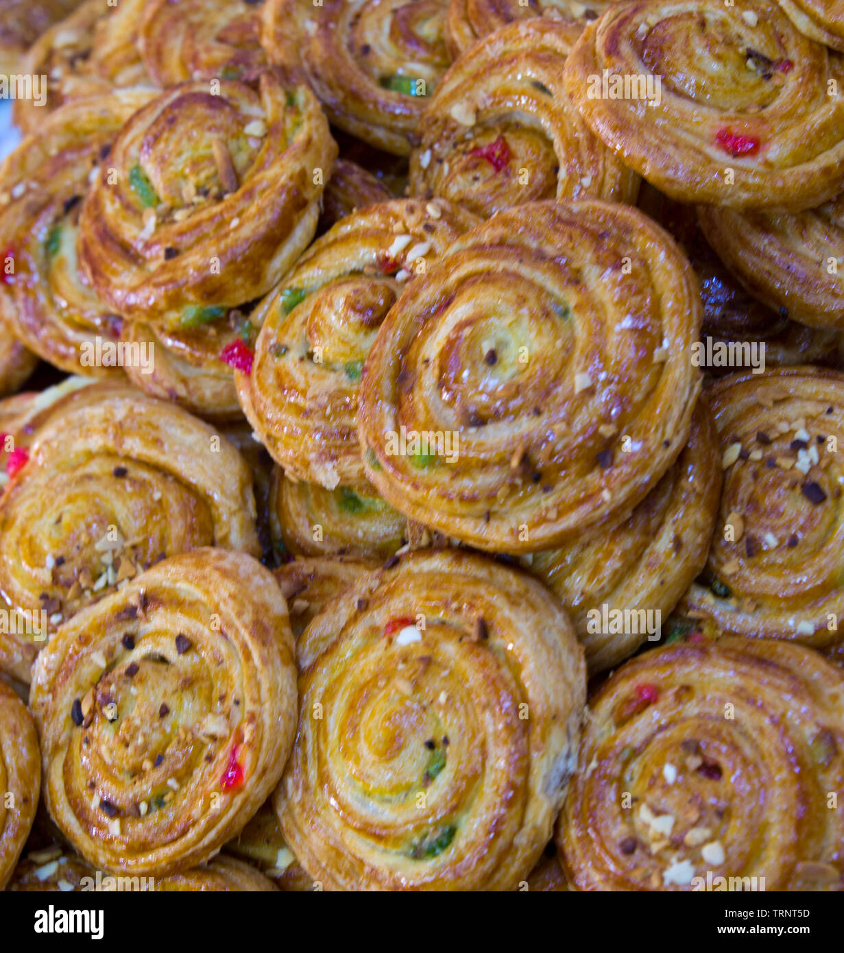 pastries on display in market bakery in morocco Stock Photo - Alamy