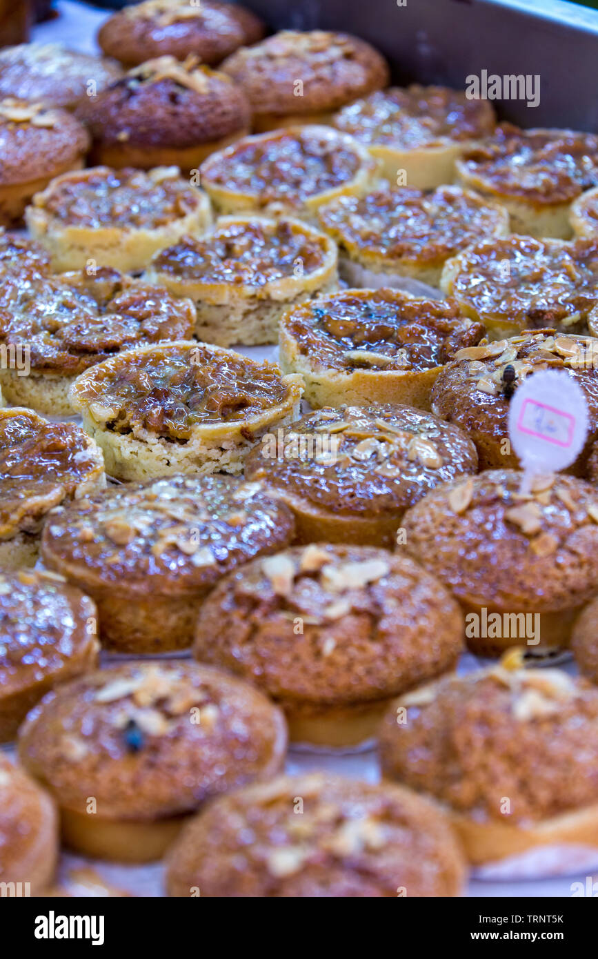 pastries on display in market bakery in morocco Stock Photo - Alamy
