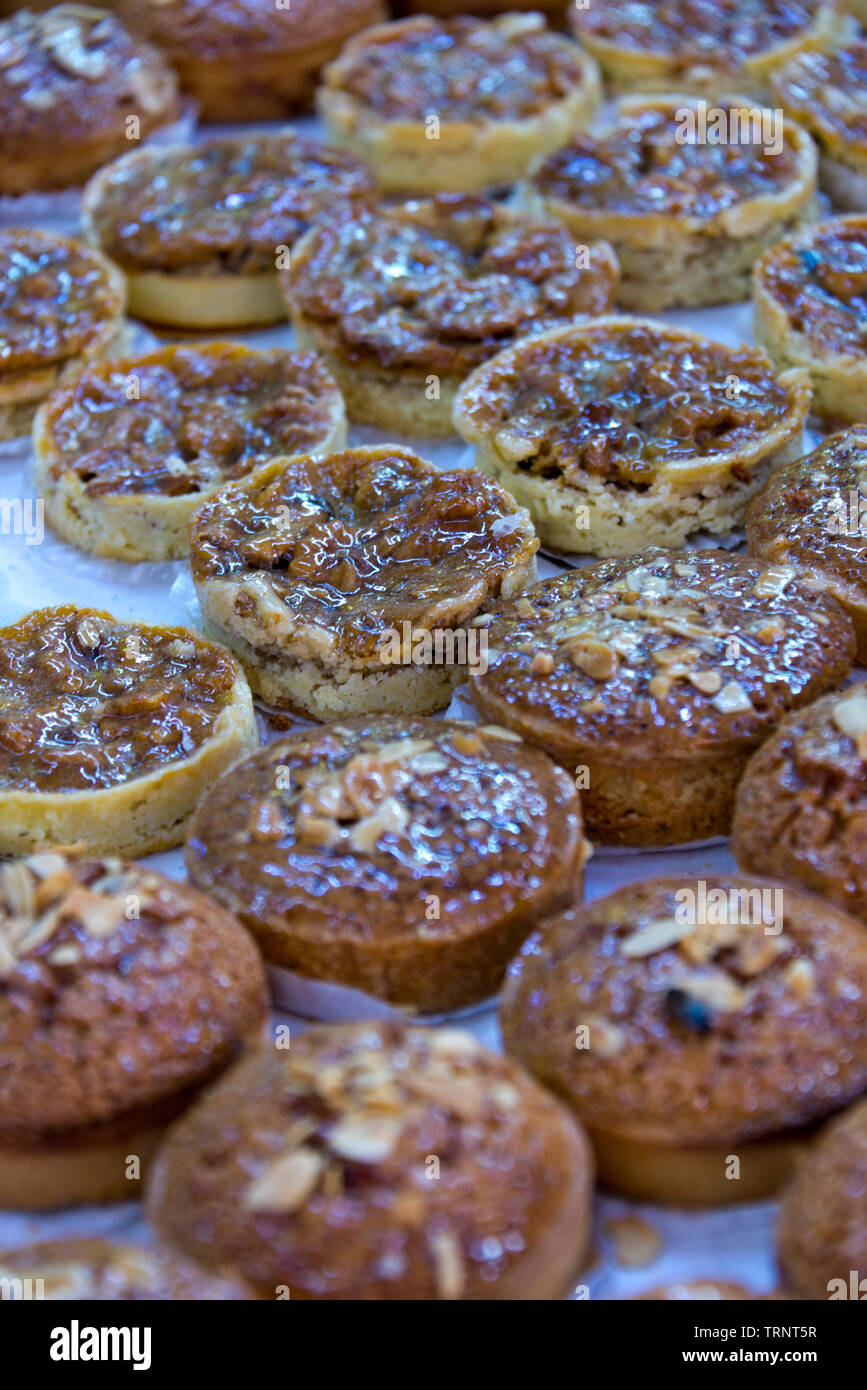 pastries on display in market bakery in morocco Stock Photo - Alamy