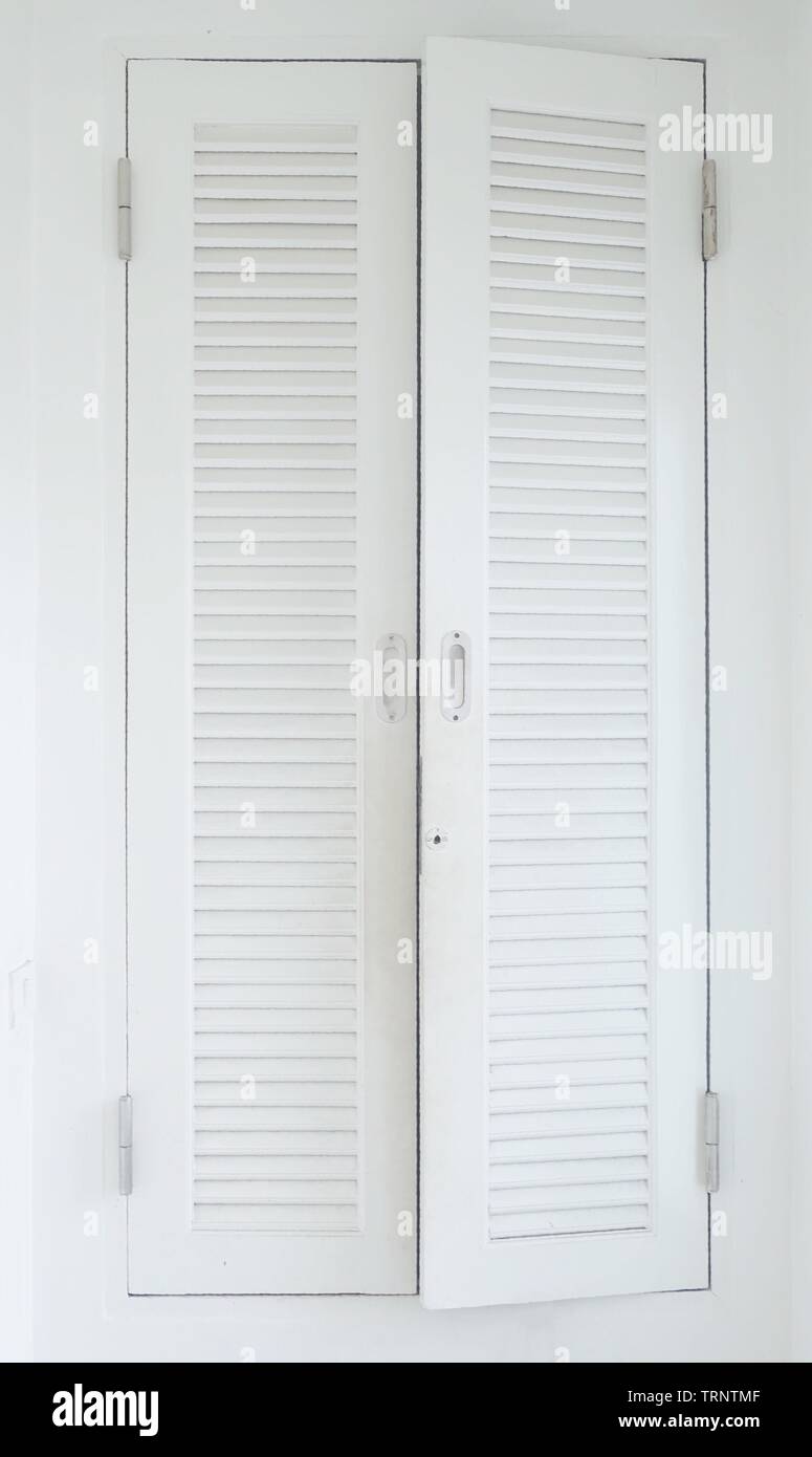Closed White Long Wooden Window with Shuttered on The Wall Stock Photo ...