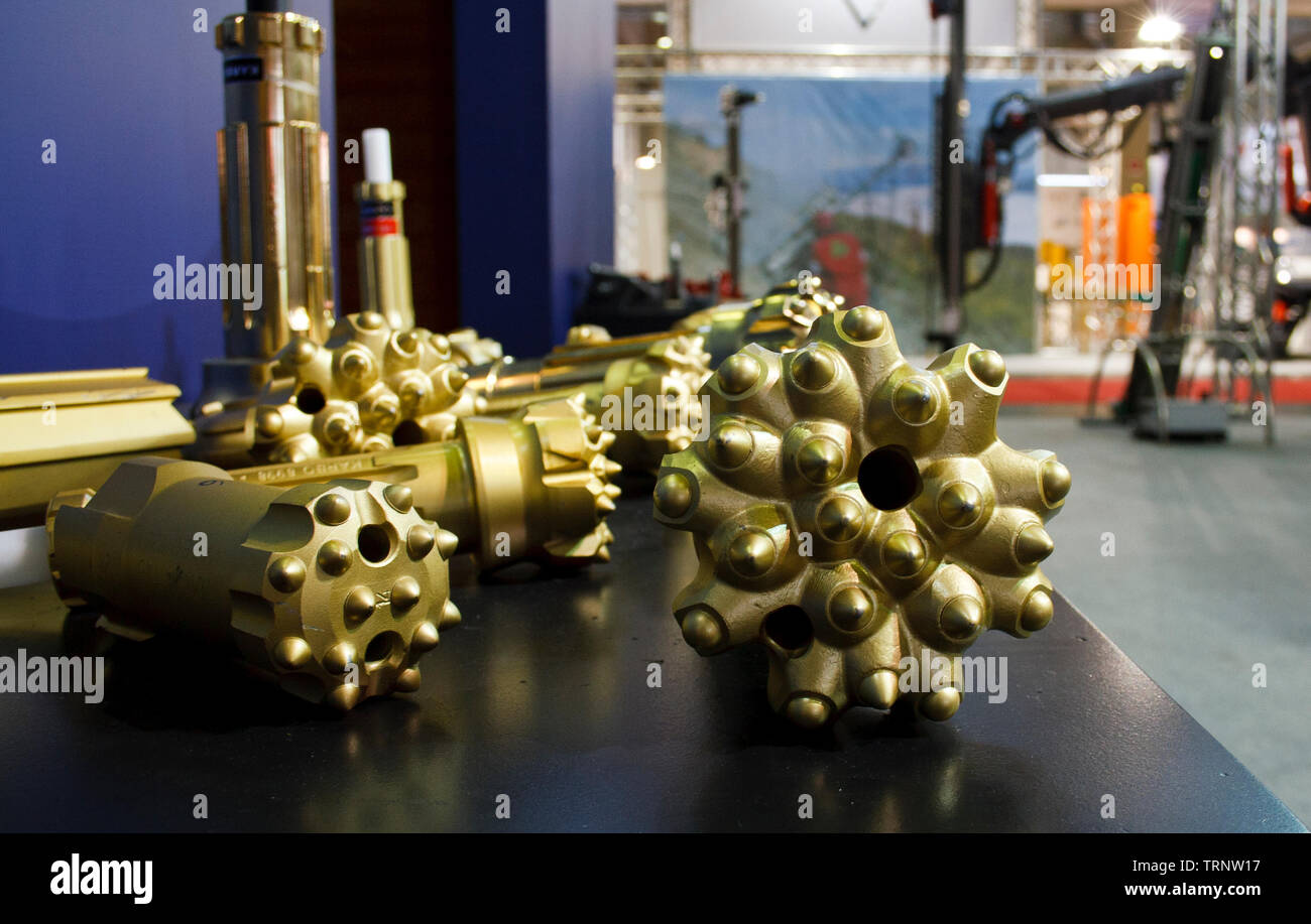 Golden oil rig drill bit detail Stock Photo - Alamy