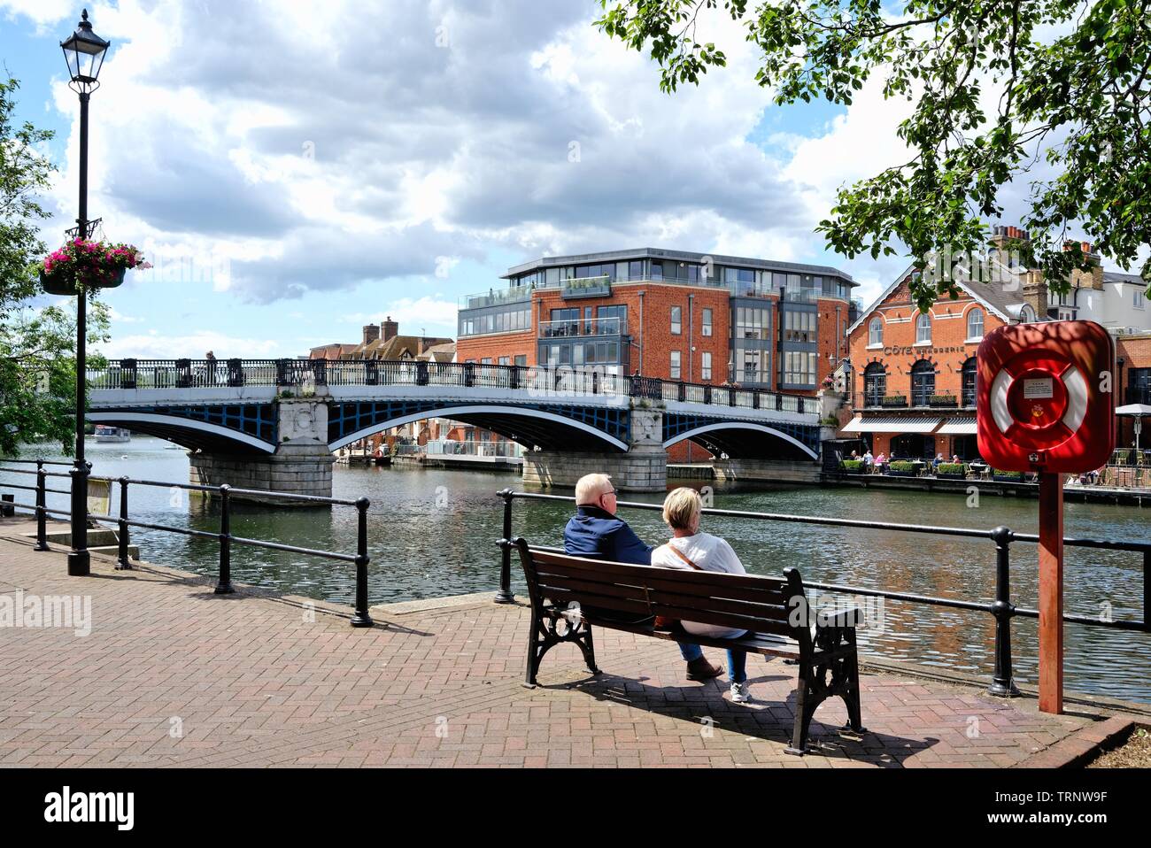 Windsor and Eton pedestrian bridge over the River Thames on a sunny ...