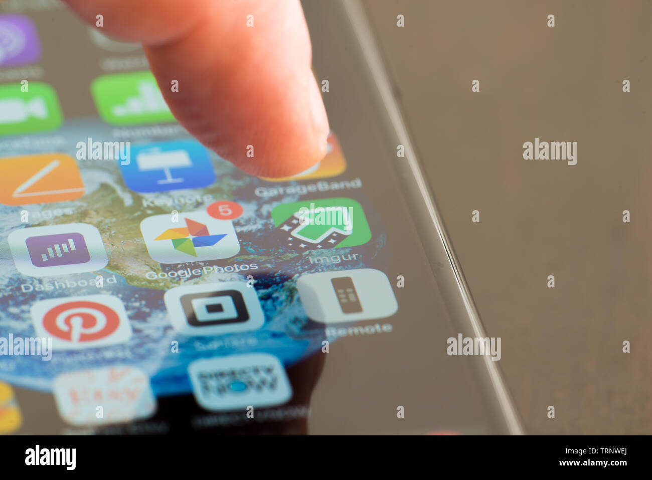 MINNEAPOLIS, MINNESOTA / USA - APRIL 25, 2019: Person using Apple i ...