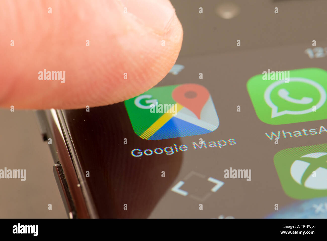 Person using google maps hi-res stock photography and images - Alamy