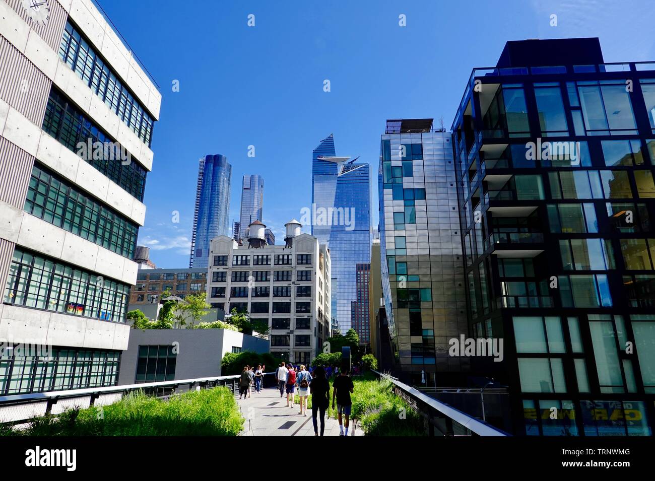 Skyline with people as seen from the public park, converted rail linear ...