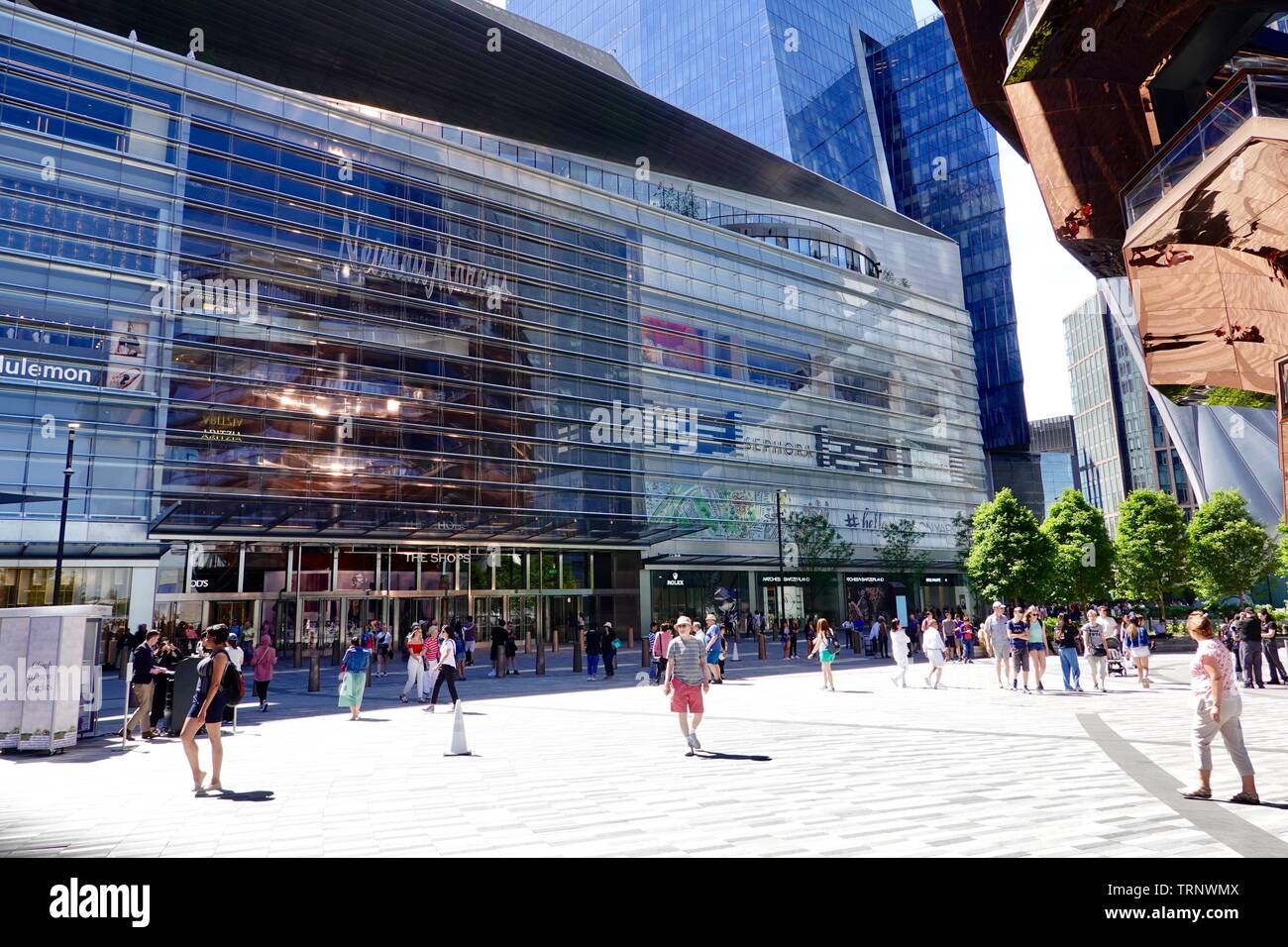 People crossing the plaza outside Neiman Marcus department store at The ...