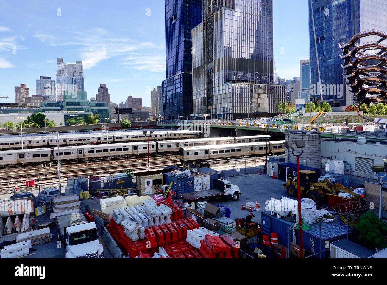 Long Island railroad trains near the Vessel, public art structure ...