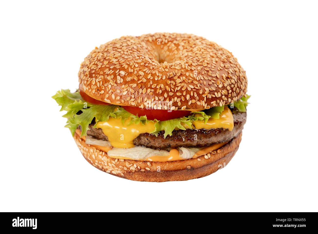 Juicy Burger on white isolated background. Bun with sesame seeds. The ...