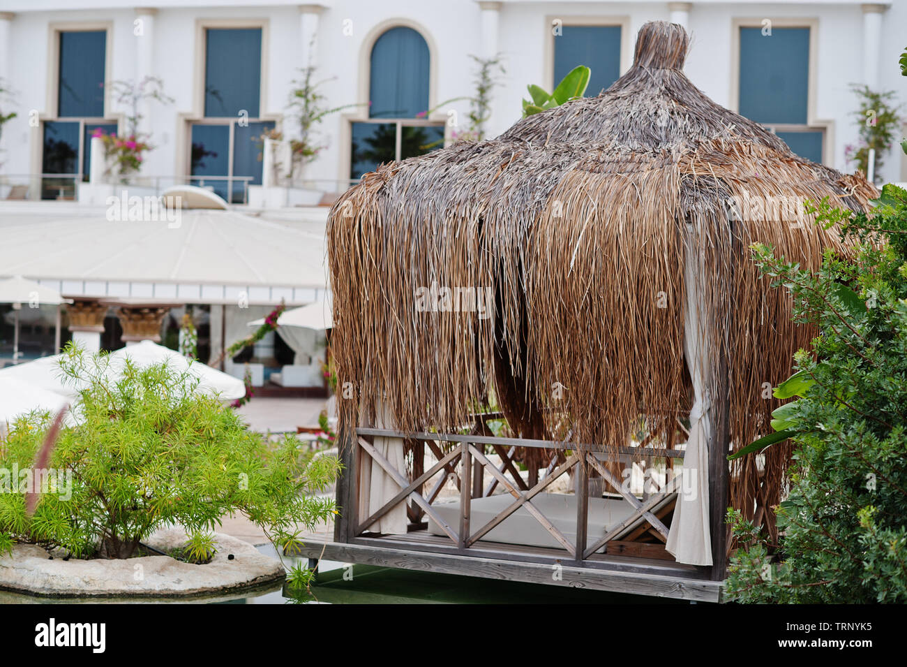 Relaxation straw spa hut zone at Turkey resort Stock Photo - Alamy