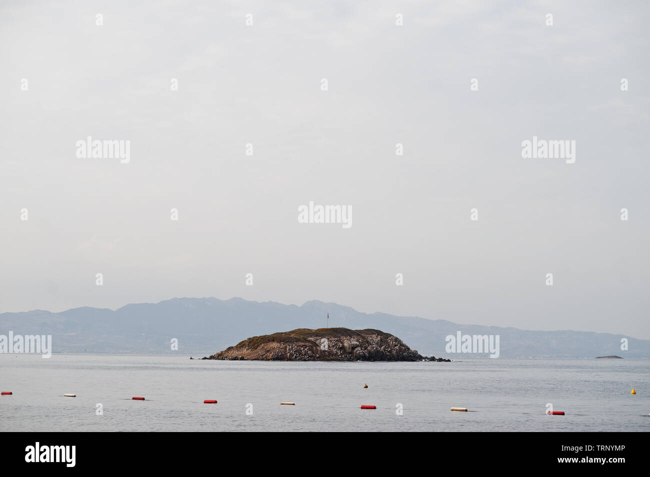 Alone island. Scenic landscape with mountain islands and blue lagoon on ...