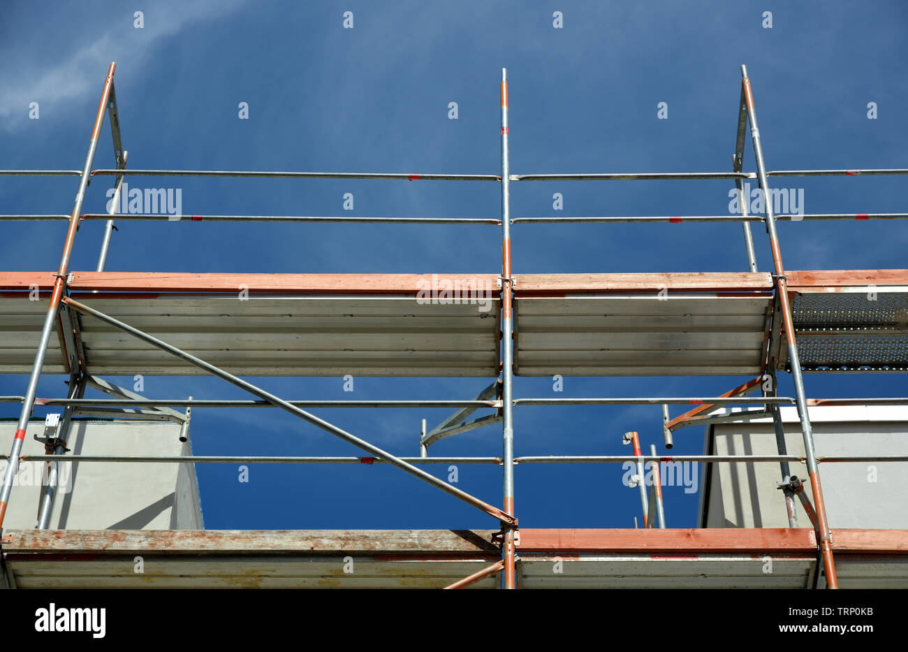 scaffolding on building against blue sky at a construction site Stock ...