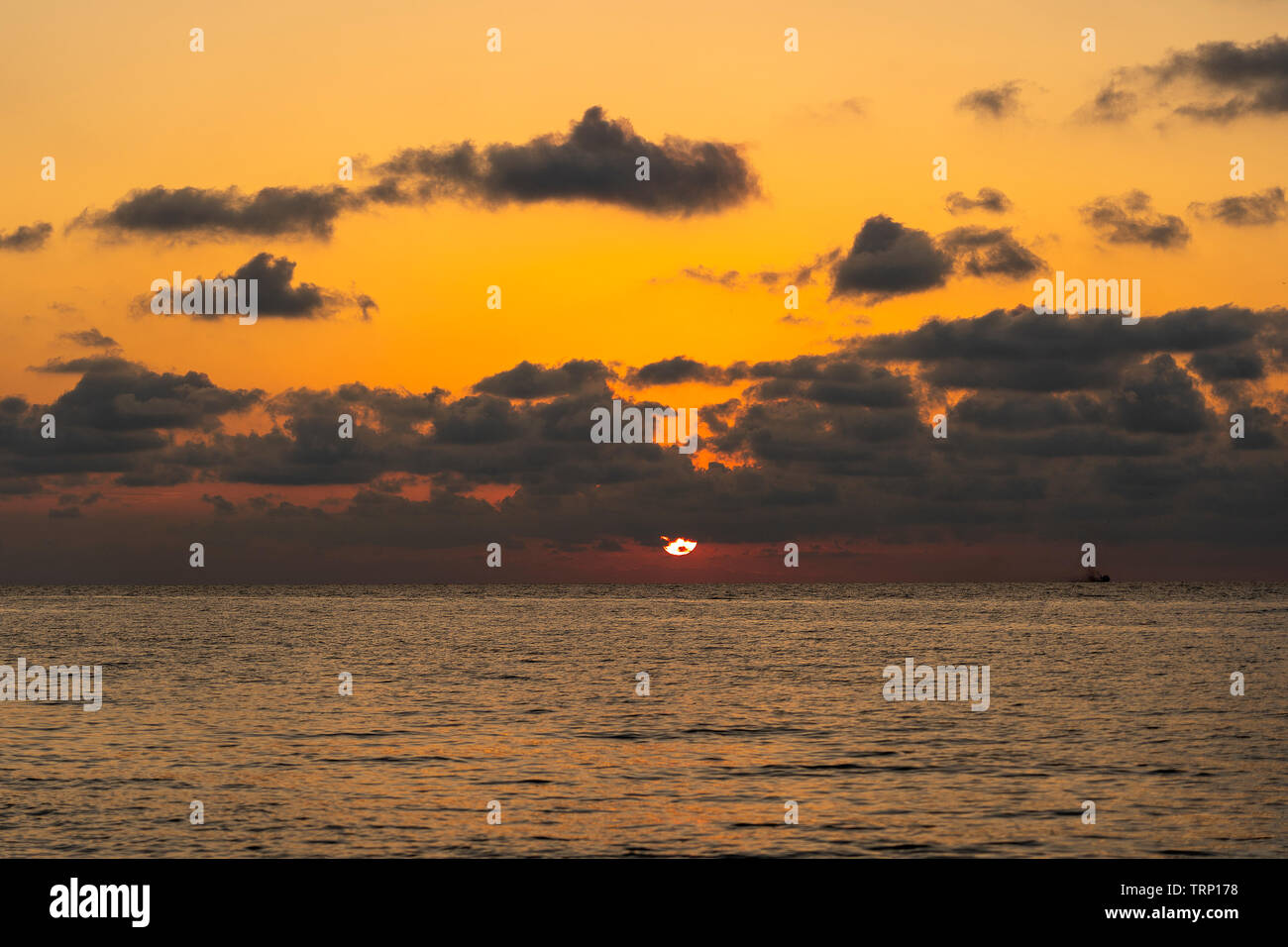 Beautiful sunset over calm sea water. Summer vacation concept Stock ...