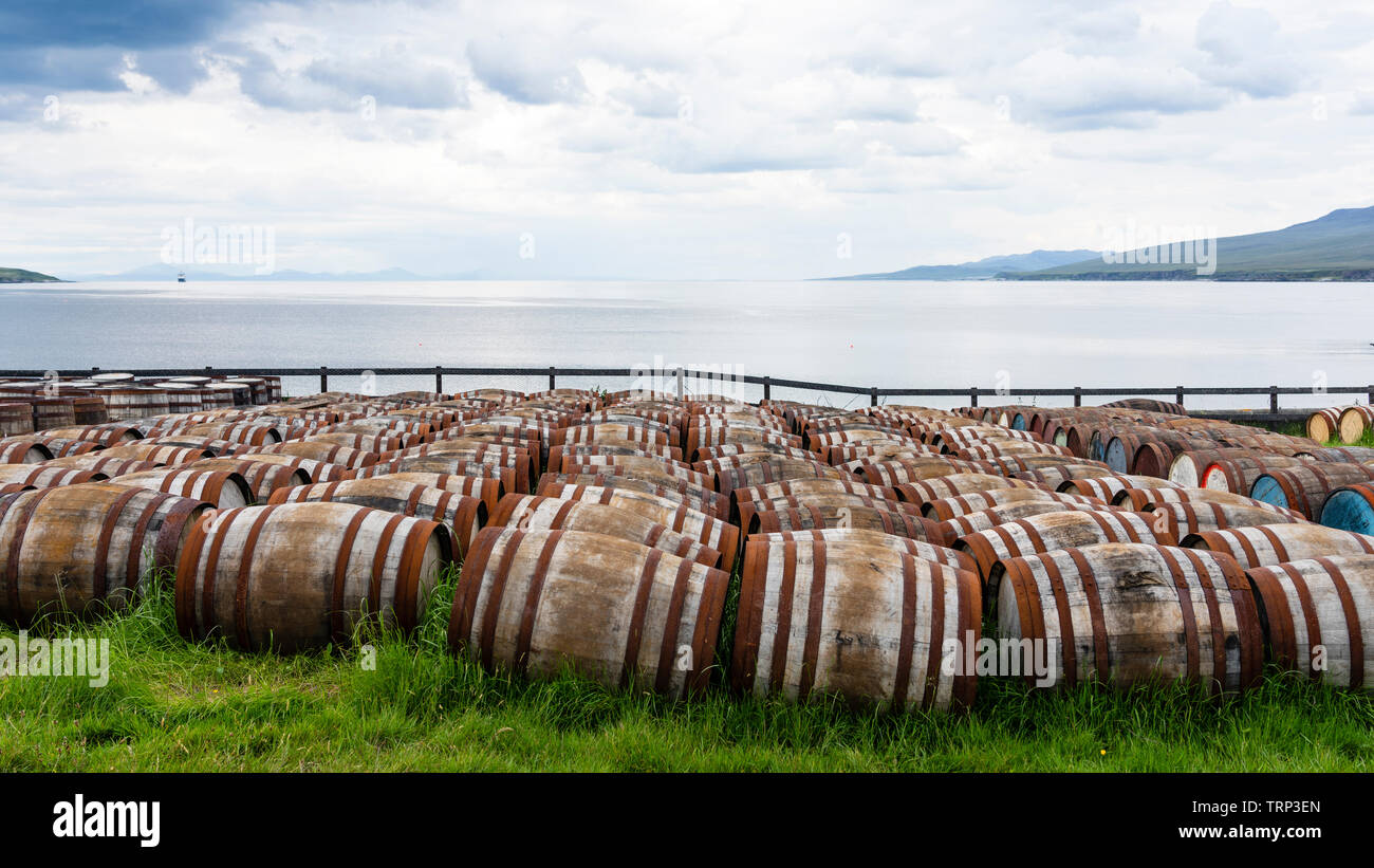 View of whisky barrels at Bunnahabhain Distillery on island of Islay in ...