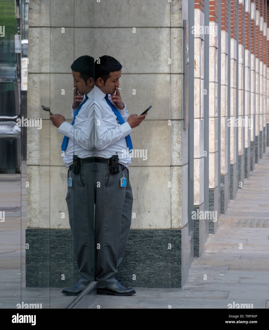 Person smoking outside office hi-res stock photography and images - Alamy