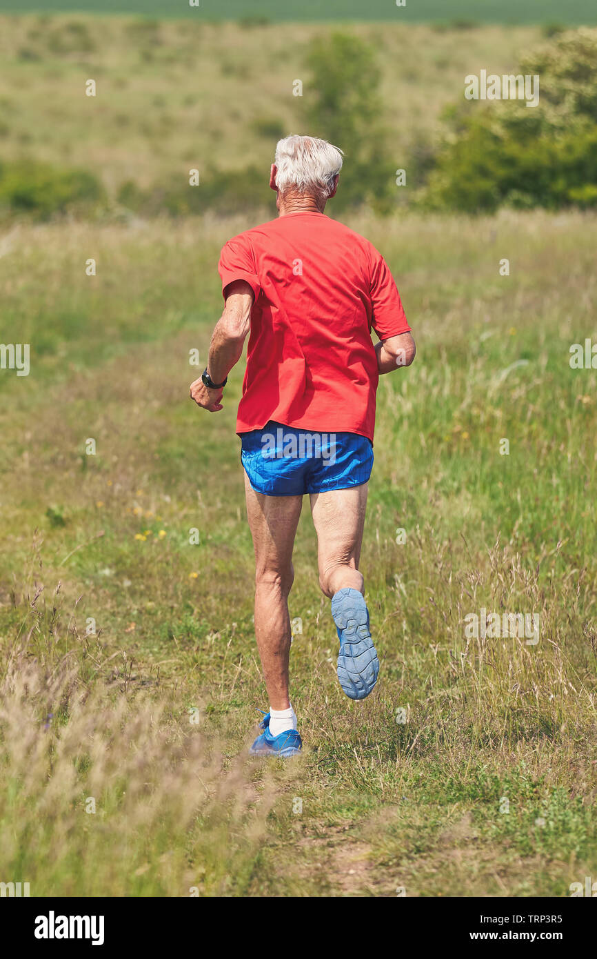 Elderly runner hi-res stock photography and images - Alamy