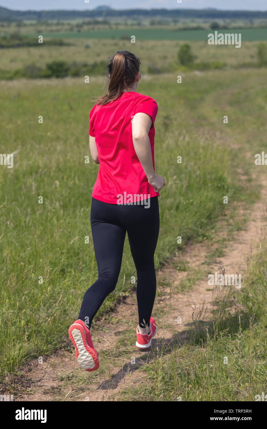 Pretty girl running hi-res stock photography and images - Alamy