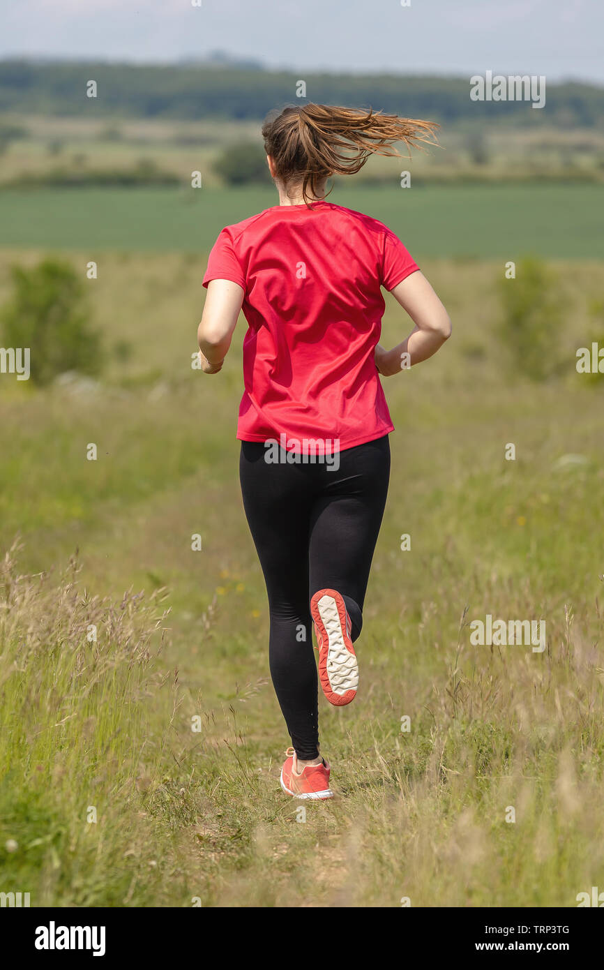 Pretty girl running hi-res stock photography and images - Alamy
