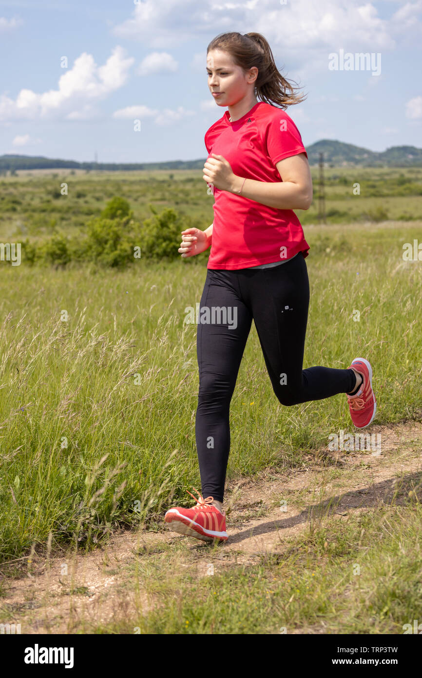 Pretty girl running hi-res stock photography and images - Alamy