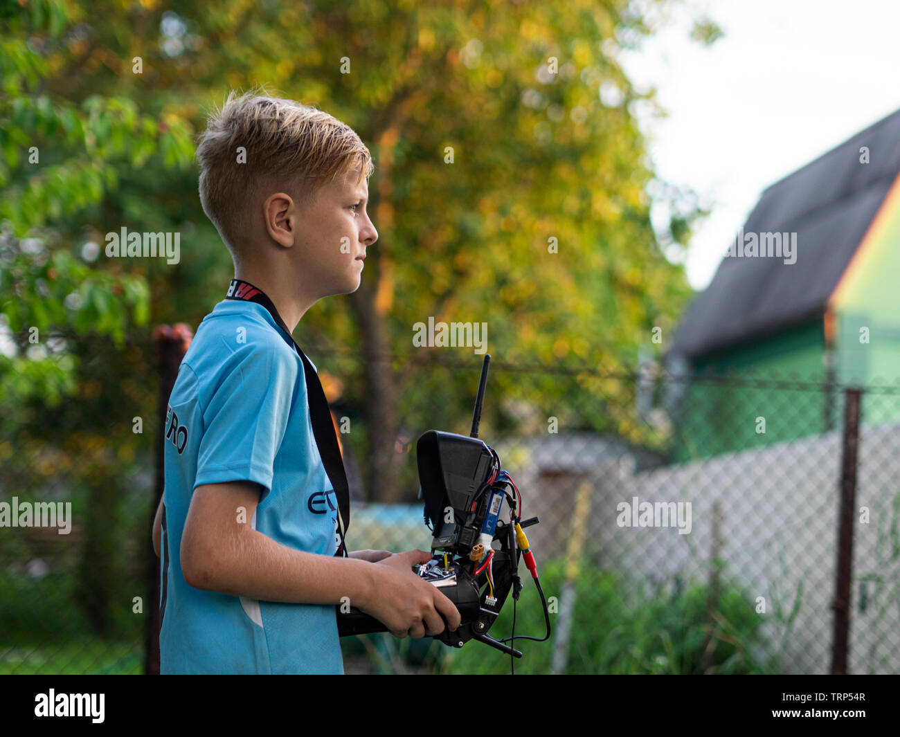 Boy with drone remote control Stock Photo - Alamy