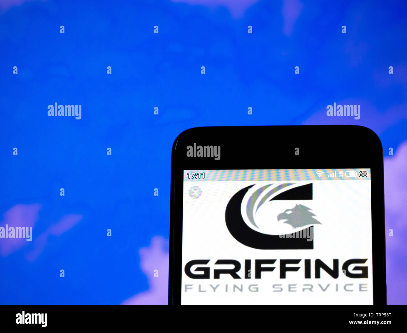 In this photo illustration the Griffing Flying Service logo is seen ...