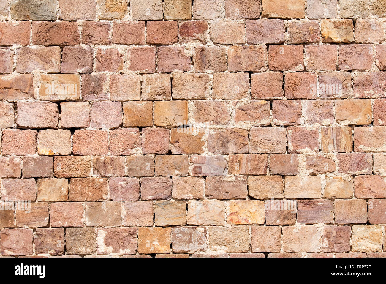 Old stone brick wall surface Stock Photo - Alamy