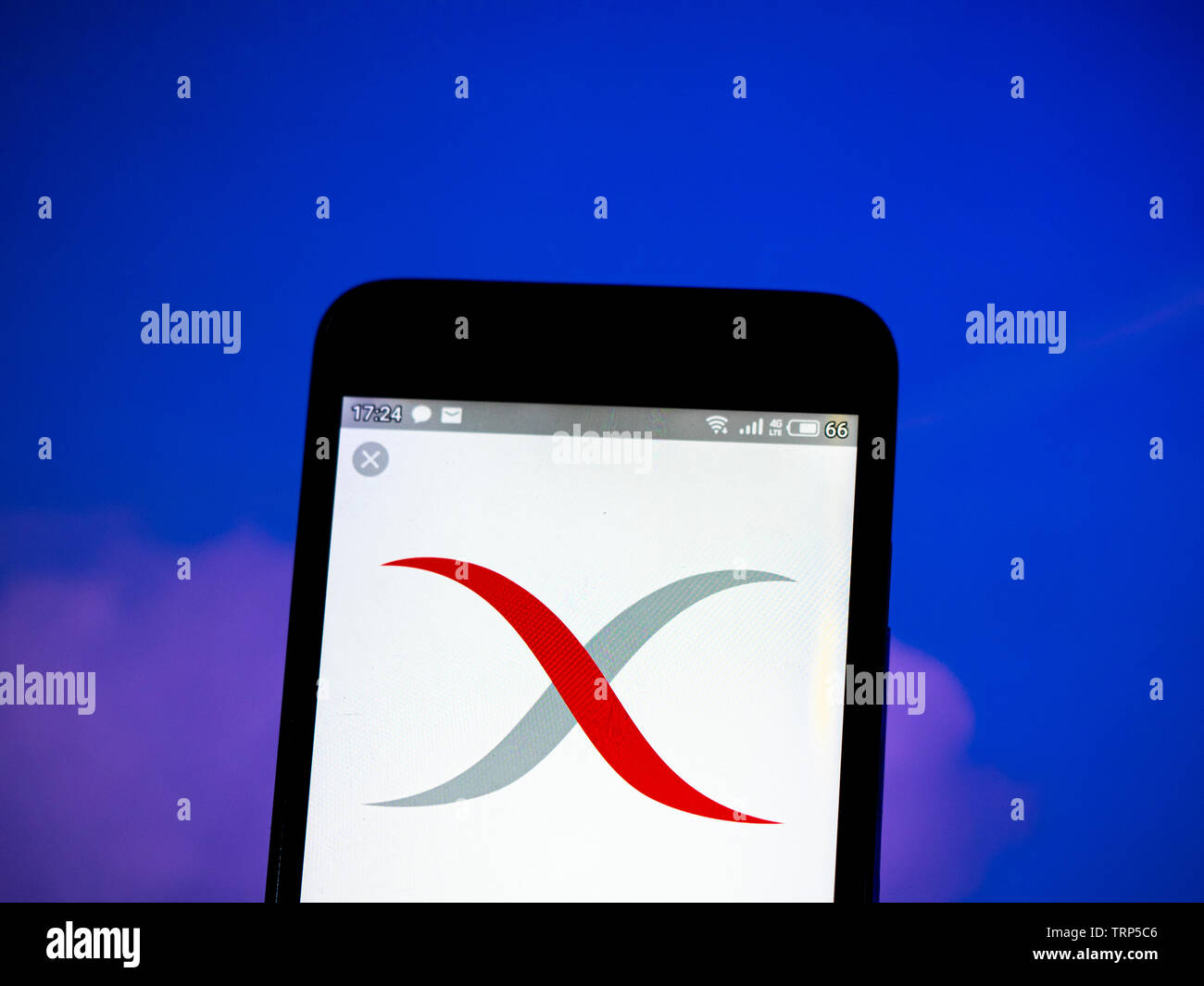 In this photo illustration the JetSuiteX logo is seen displayed on a ...