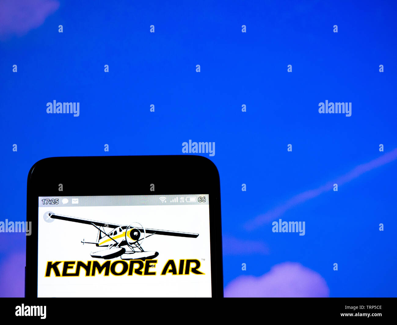 In this photo illustration the Kenmore Air Harbor, Inc logo is seen ...