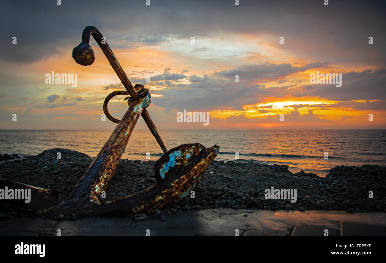 Anchor on the beach Stock Photo - Alamy