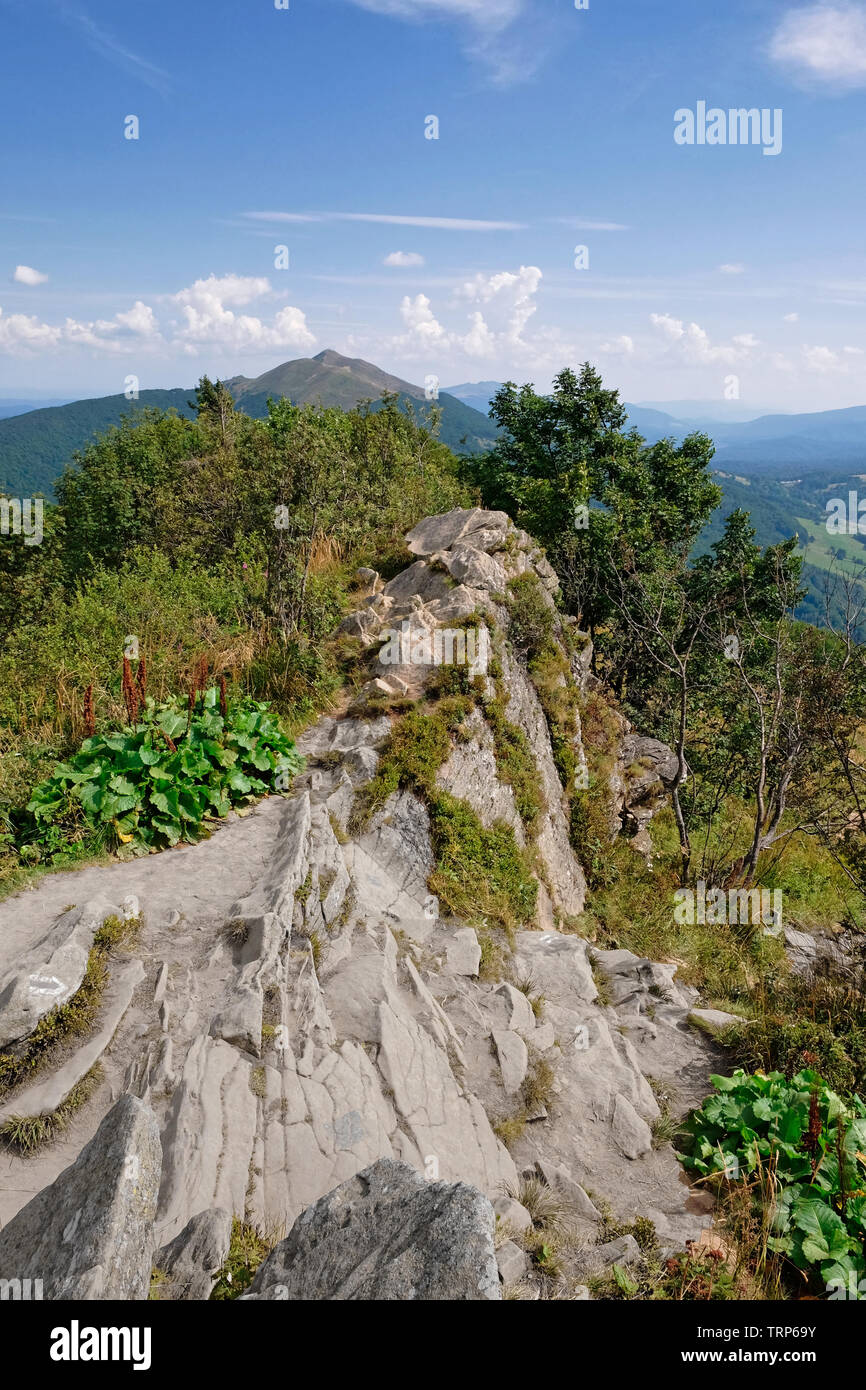 Mountain view landscape from hill over blue sky background Stock Photo ...