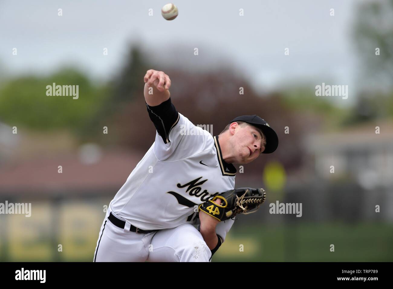 Pitcher releasing a pitch to a waiting hitter. USA Stock Photo - Alamy