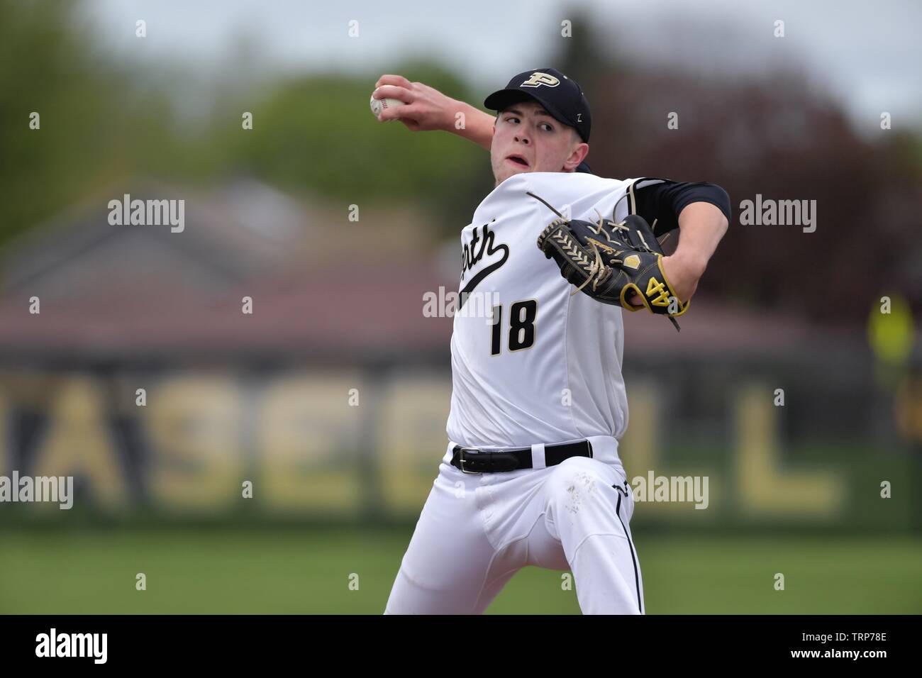 Pitcher releasing a pitch to a waiting hitter. USA Stock Photo - Alamy