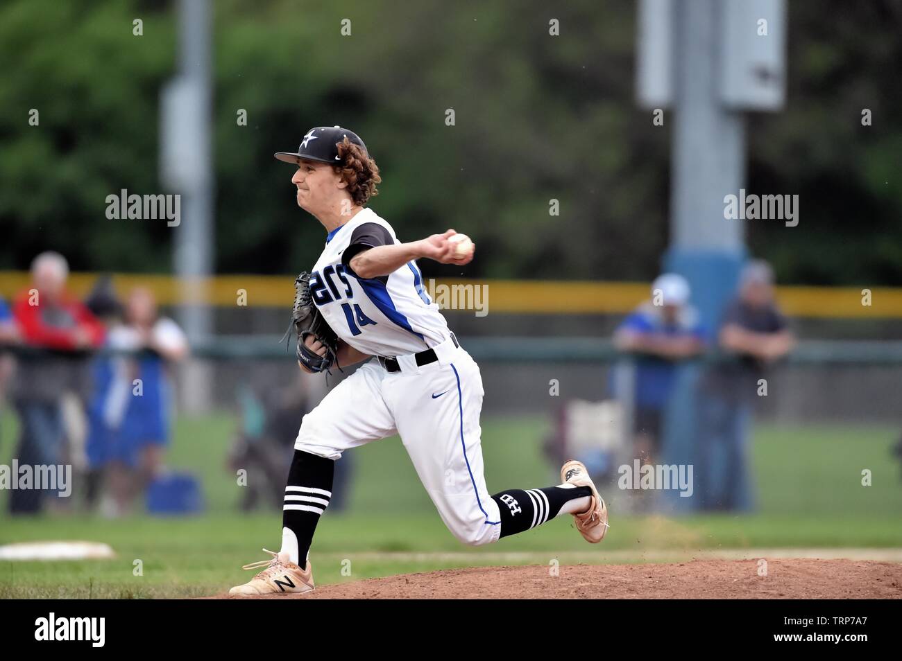 Pitcher releasing a pitch to a waiting hitter. USA Stock Photo - Alamy