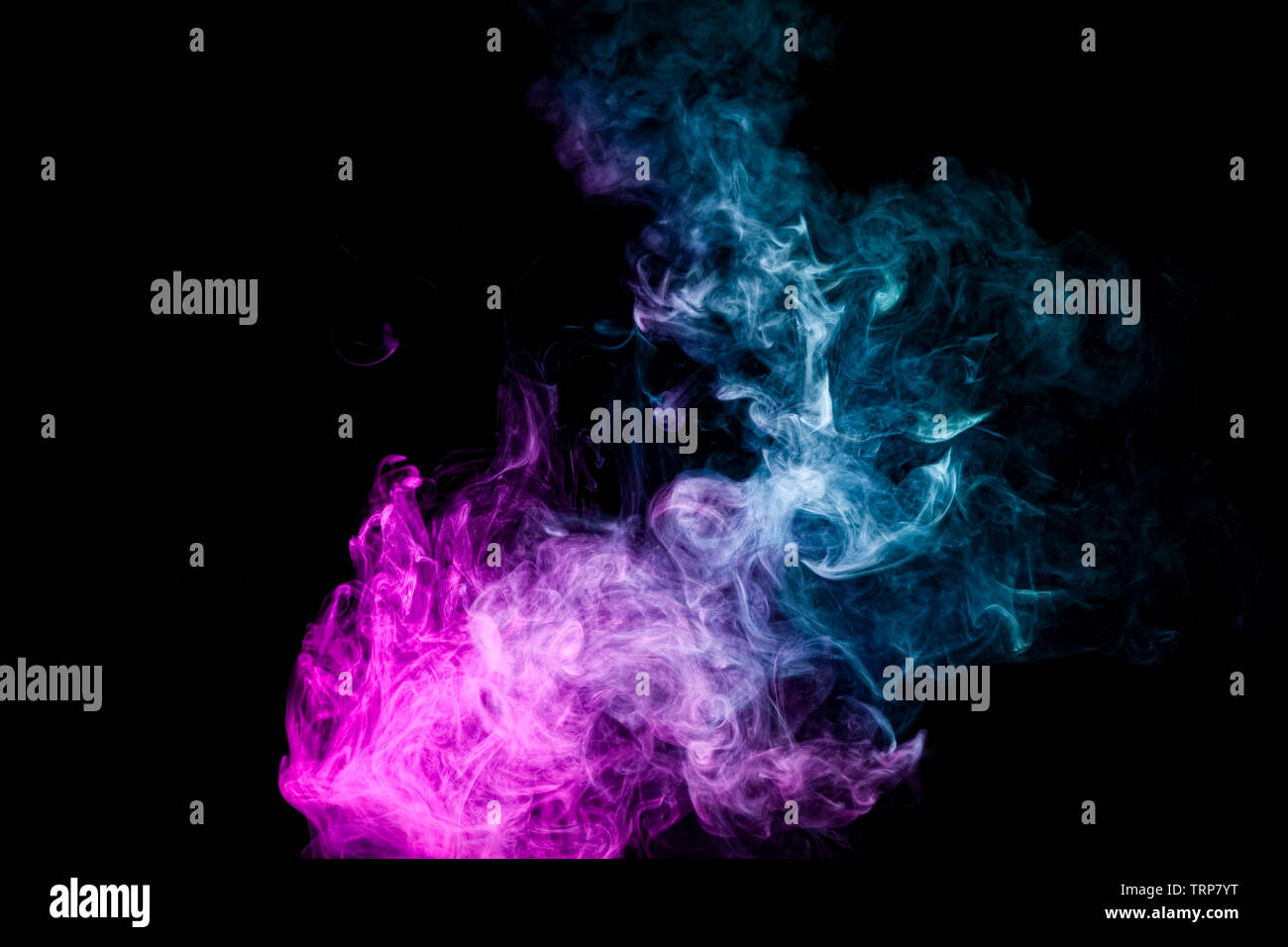 Colorful pink and blue smoke on a black isolated background. Background ...