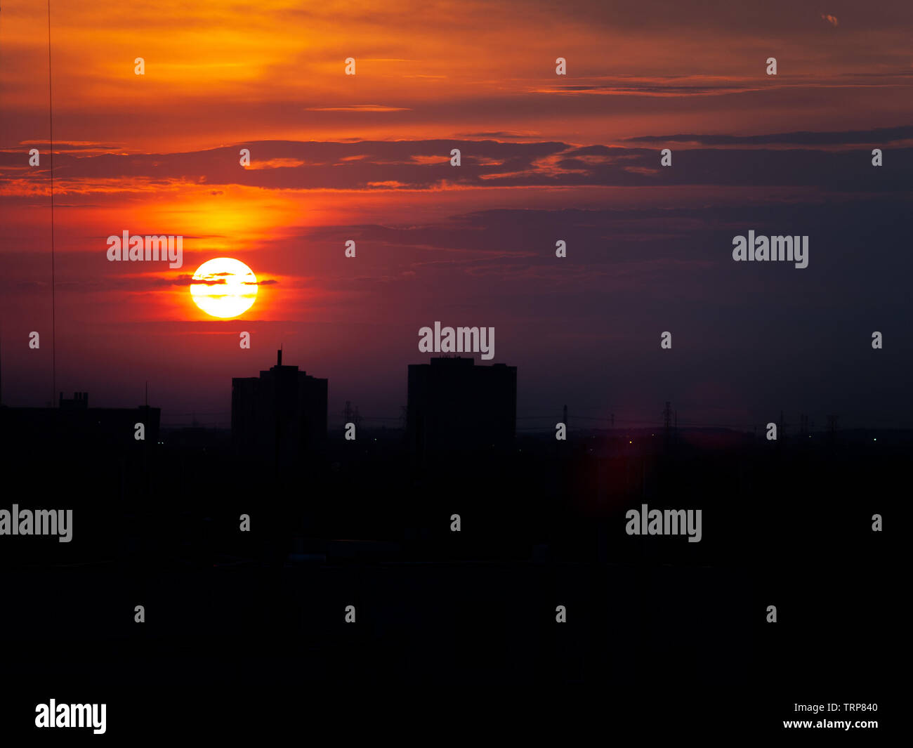 Sun on distant buildings hi-res stock photography and images - Alamy