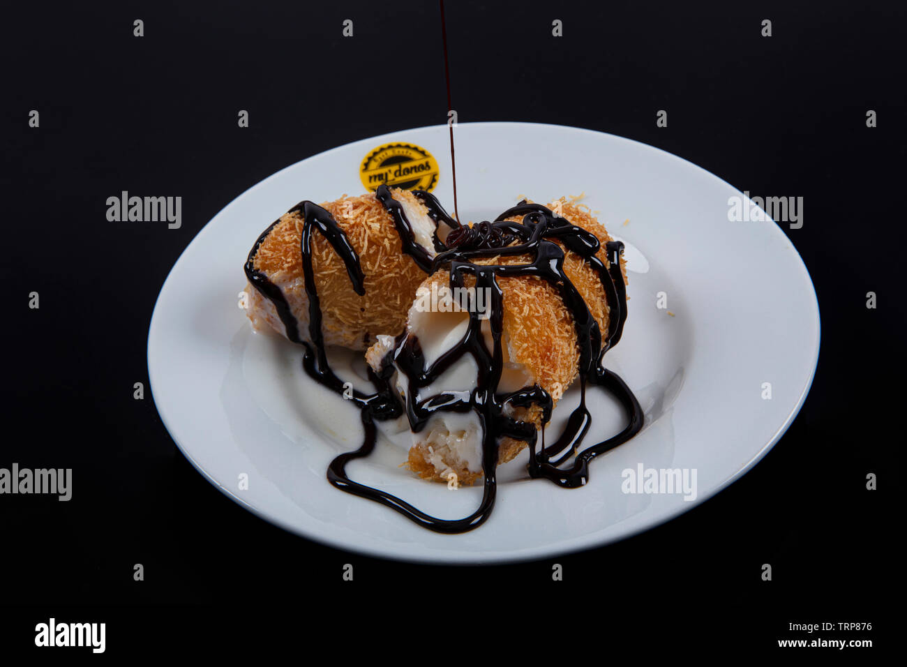Delicious Turkish dessert. Fried ice-cream covered with chocolate ...