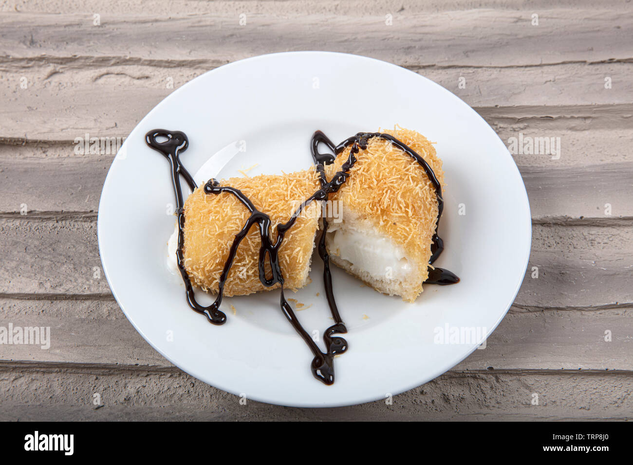 Delicious Turkish dessert. Fried ice-cream covered with chocolate ...