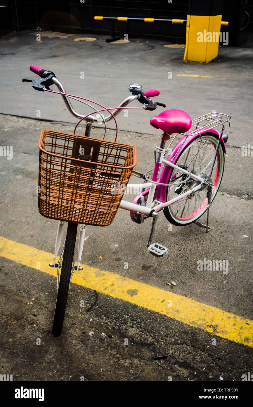 Pink bike white basket hi-res stock photography and images - Alamy