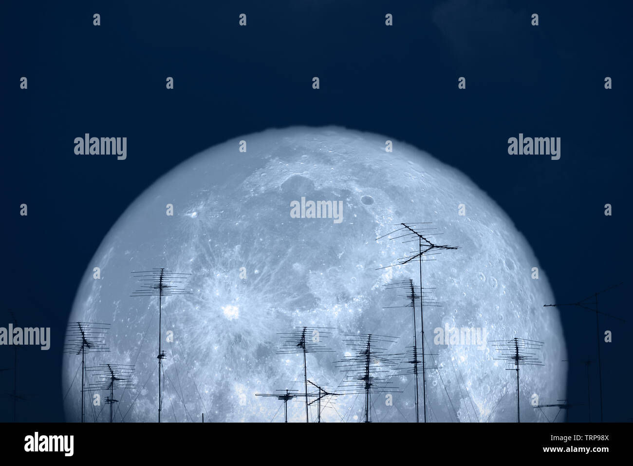 full milk moon back on silhouette antennas on night sky, Elements of ...